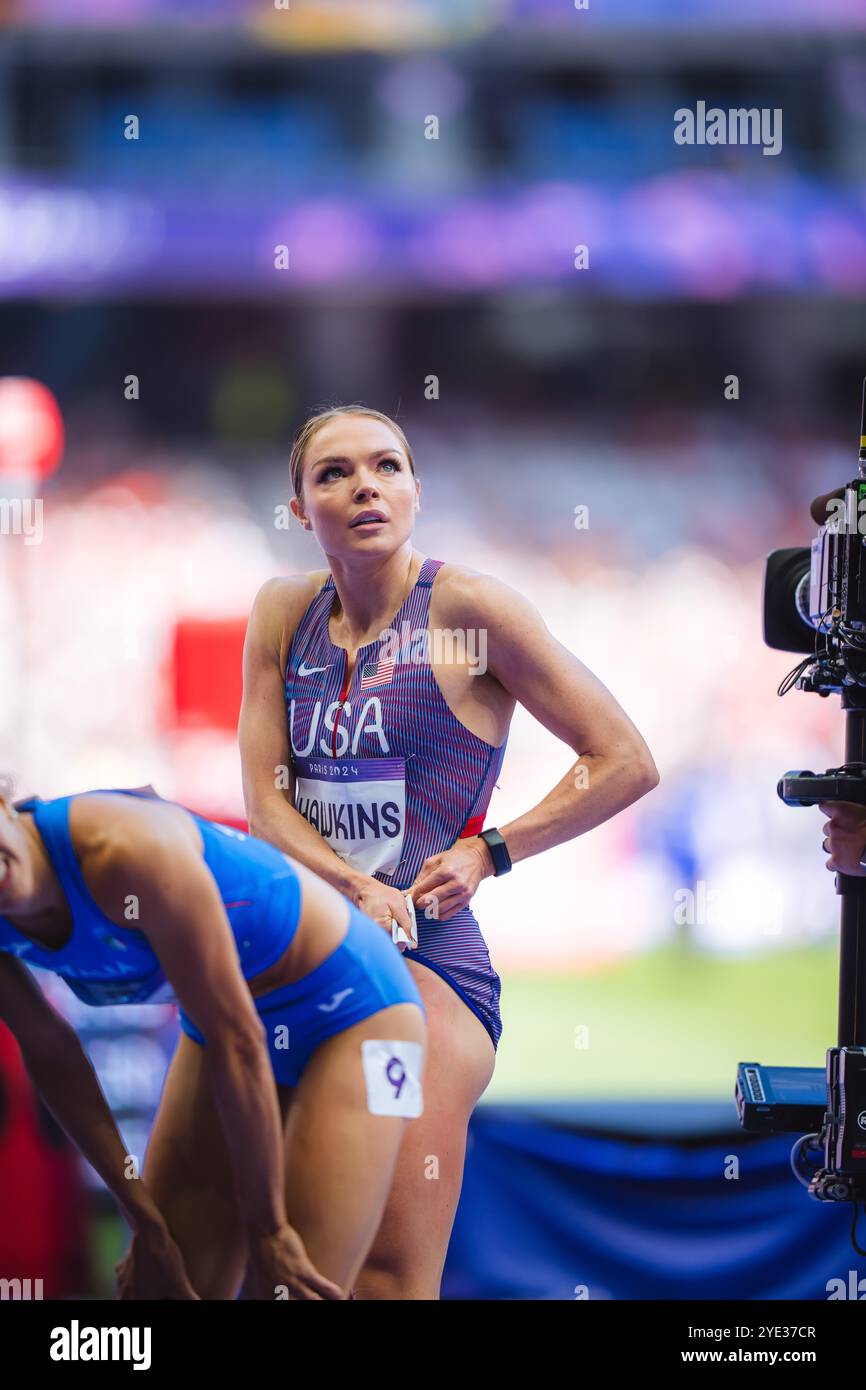 Chari Hawkins participating in the 100 meters hurdles at the Paris 2024 ...