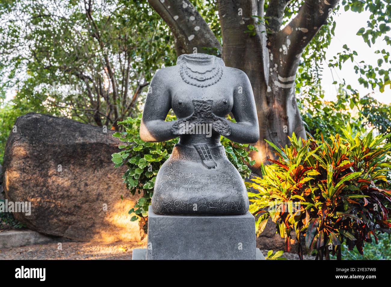 Buddhist statue of a female deity in park at the pagoda in Vietnam ...