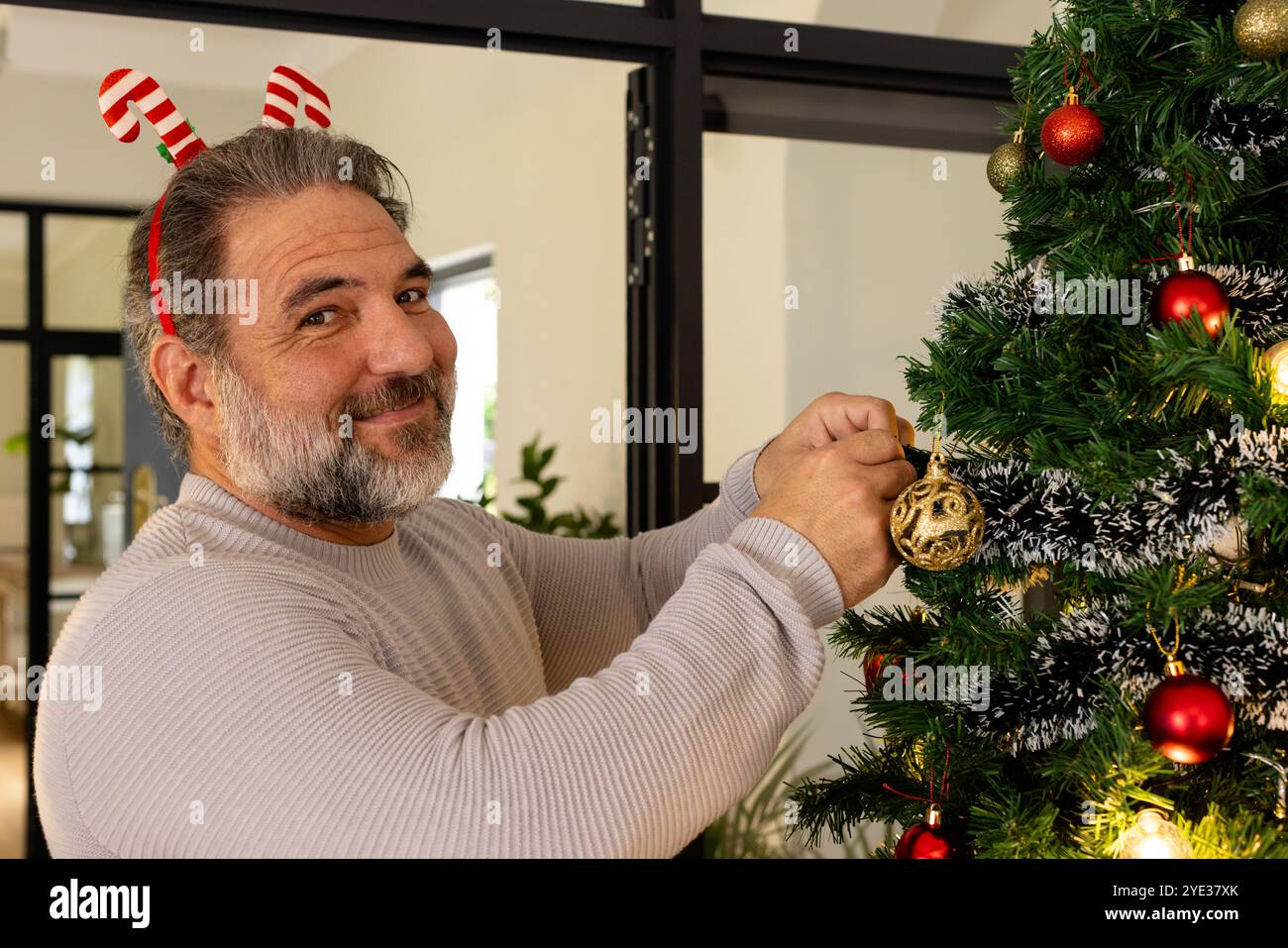 Smiling mature christmas man hi-res stock photography and images - Alamy