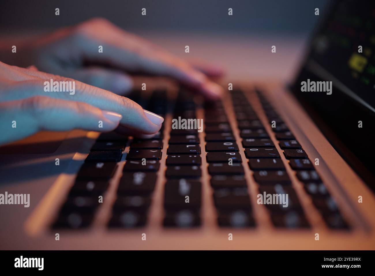 Typing on Laptop Keyboard During Night Work Stock Photo - Alamy