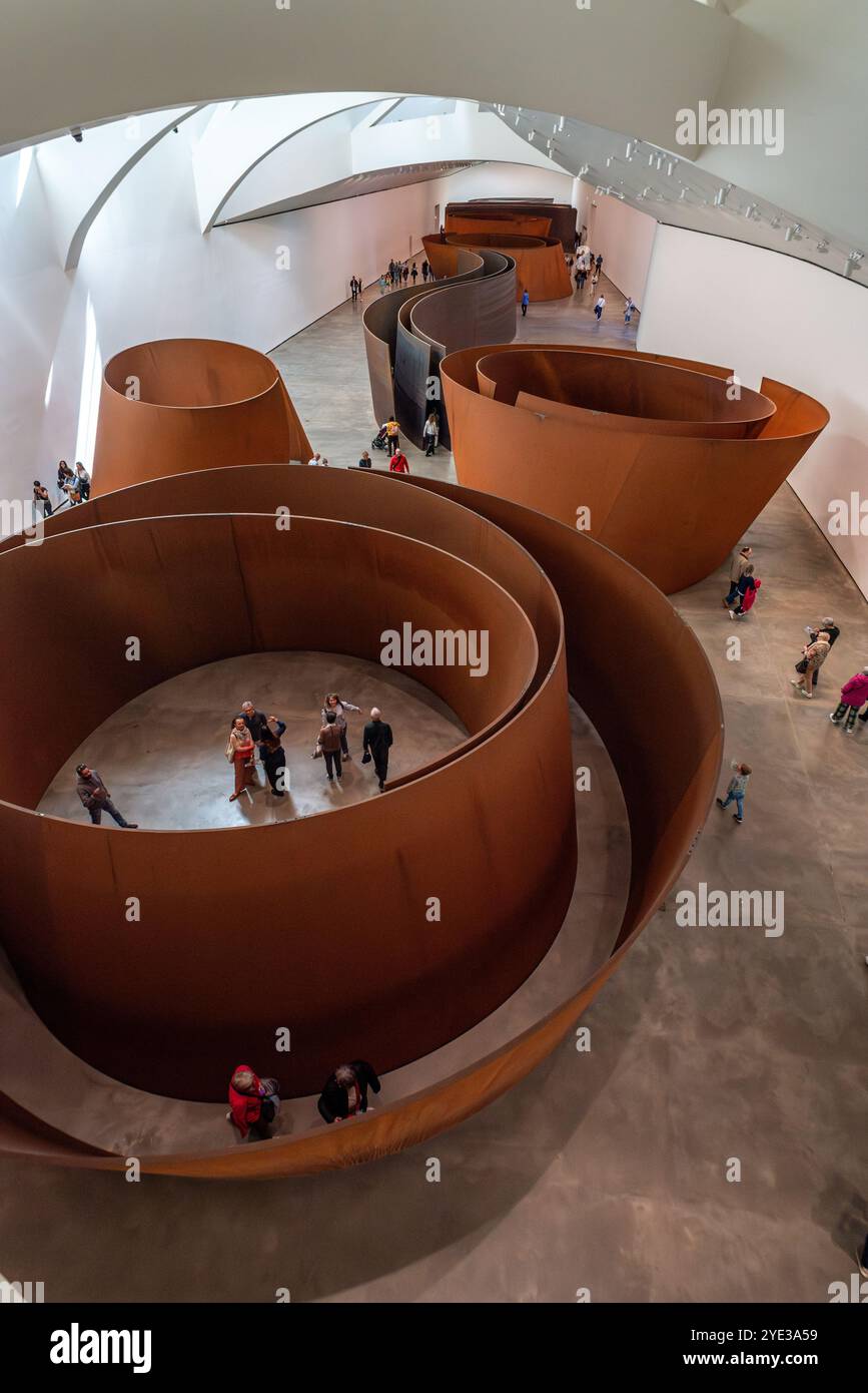 Bilbao, Spain - Mai 16, 2024 - Giant steel sculpture The Matter Of Time ...