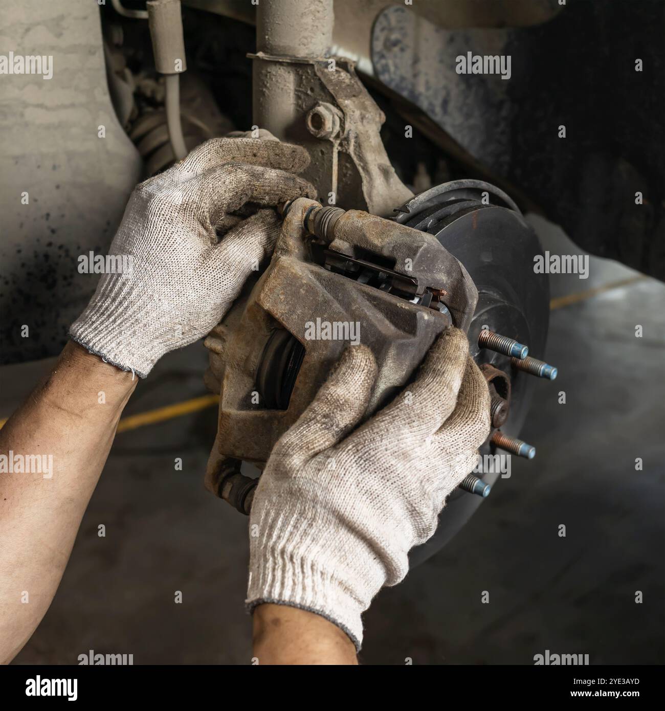 The process of servicing old brake calipers of a passenger car, close ...