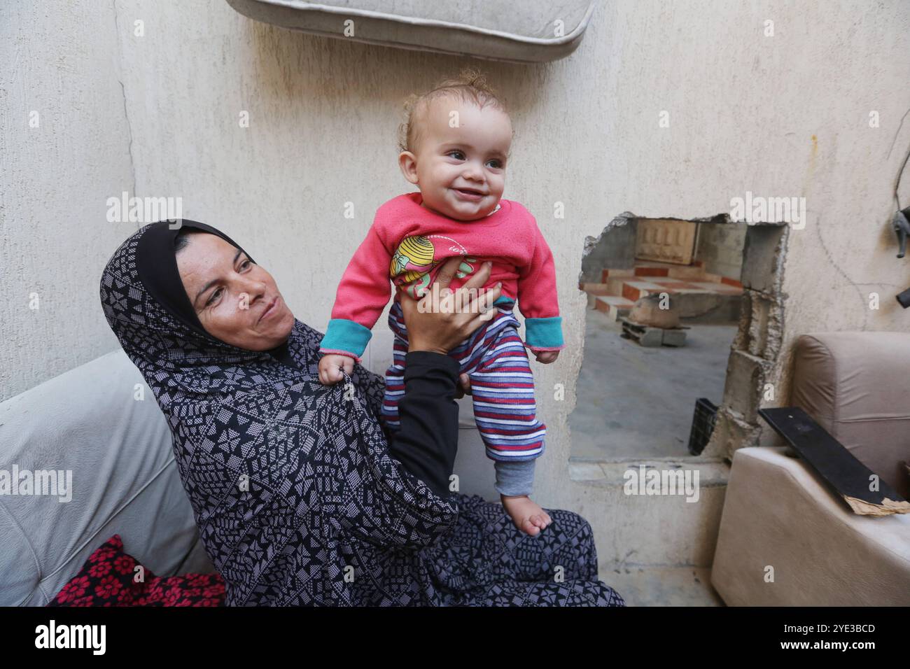 Palestinian baby Reem Abu Hayya, 8 months old, is being cared for by ...