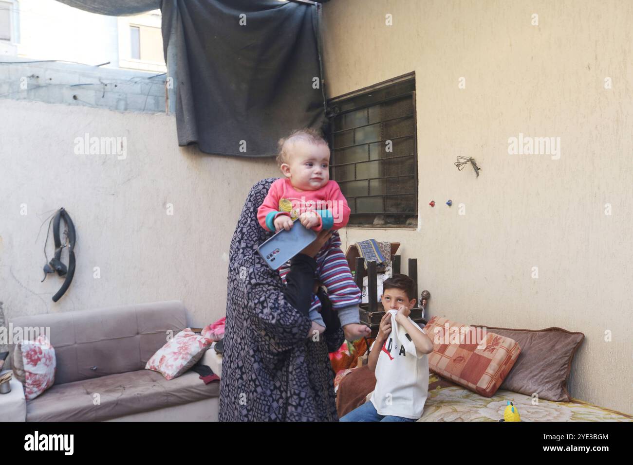 Palestinian baby Reem Abu Hayya, 8 months old, is being cared for by ...