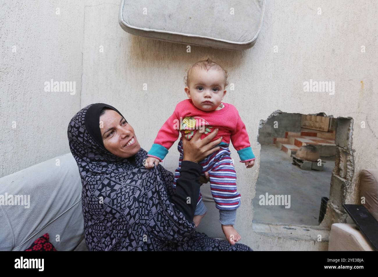 Palestinian baby Reem Abu Hayya, 8 months old, is being cared for by ...