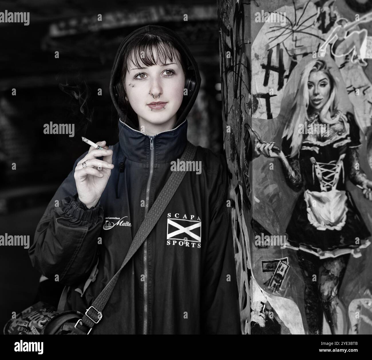 A girl with piercings smoking a cigarette at the southbank skatepark in ...