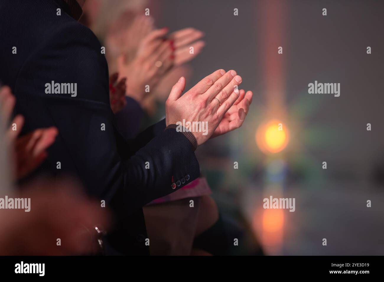 Woman applause group celebration hi-res stock photography and images ...