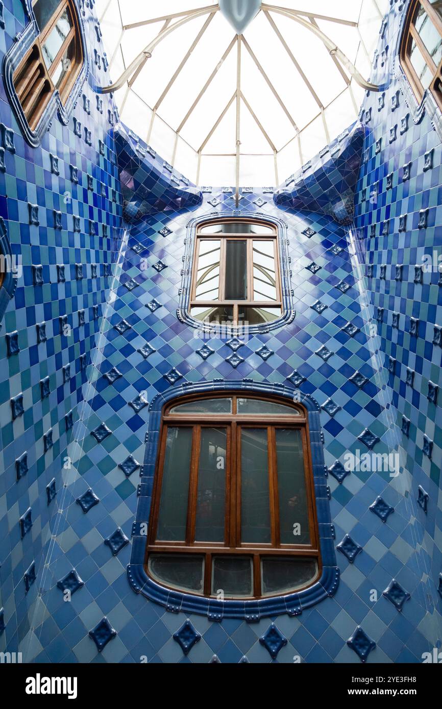 Blue tiled lightwell in the Casa Batlló, designed by Antonio Gaudi ...
