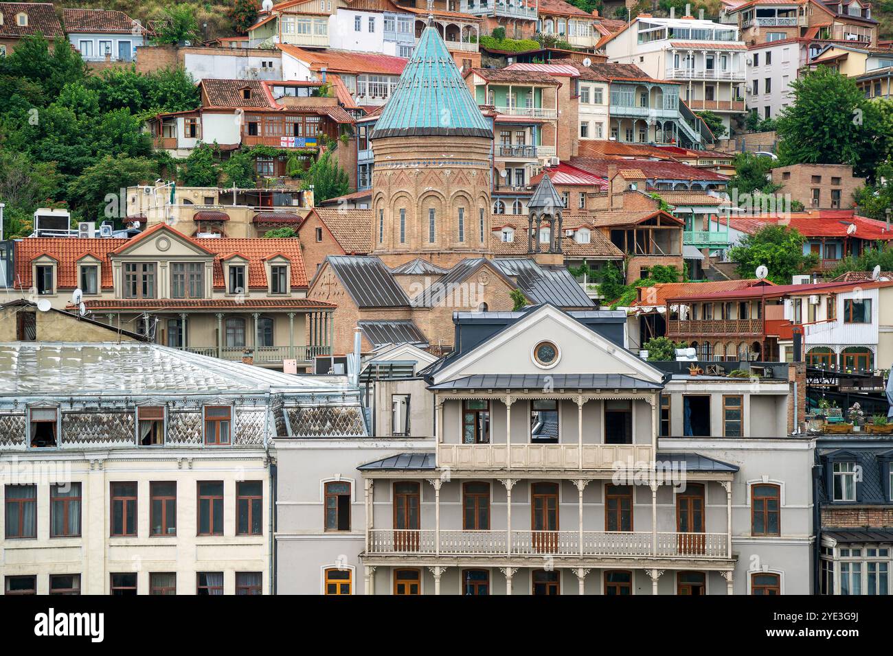 Colorful traditional houses with wooden carved balconies in the Old ...