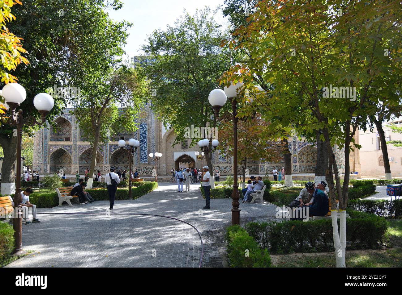Bukhara, Uzbekistan - Sept 12, 2024: Local people relax in public park ...