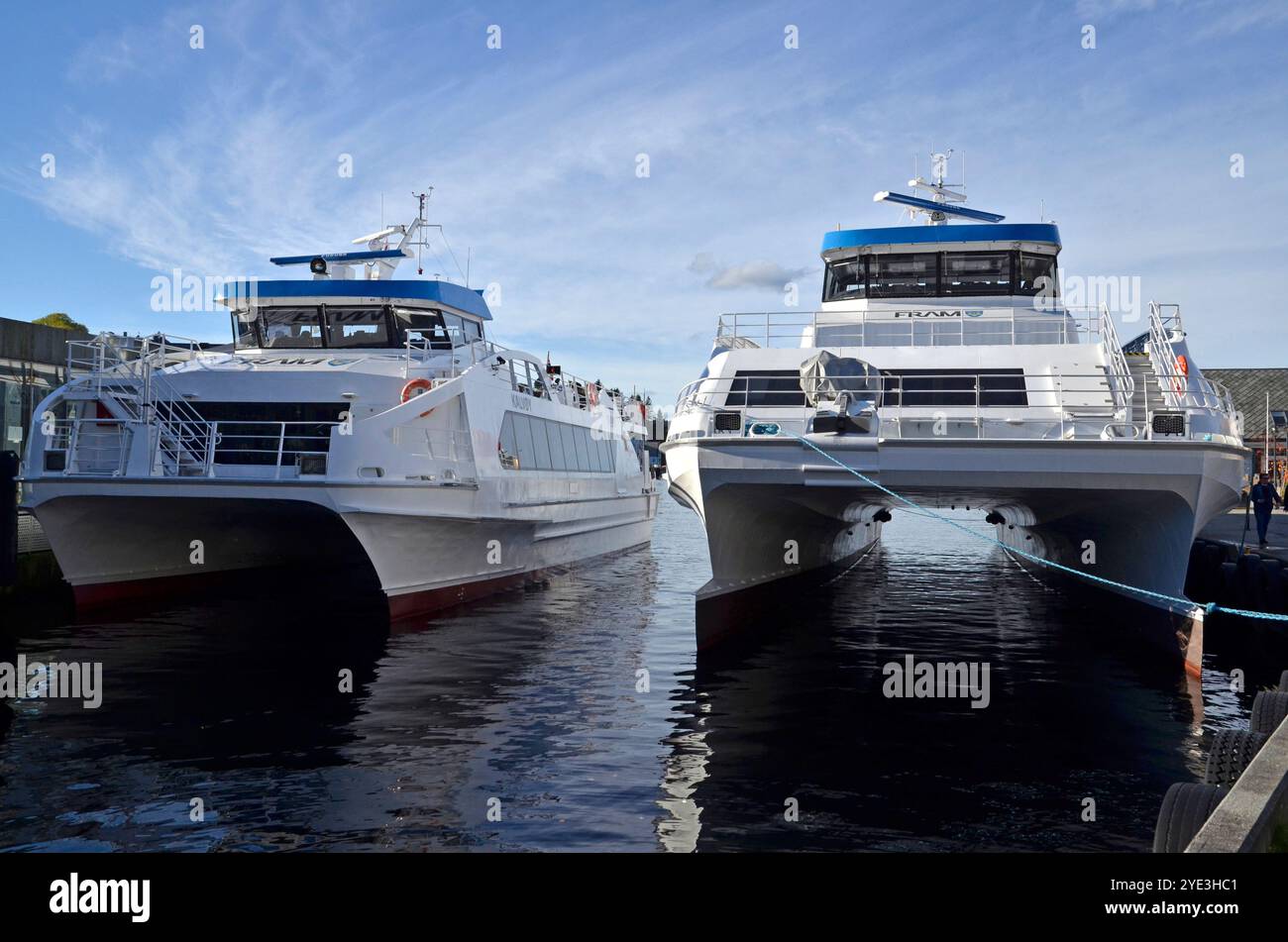 Catamaran ferries in the main harbour in the Norwegian town of Alesund ...
