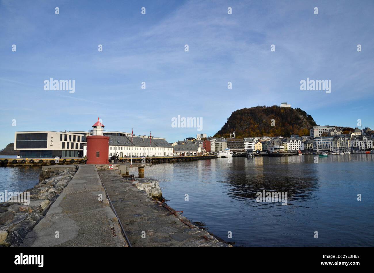 Molja lighthouse on the main harbour in the Norwegian town of Alesund ...