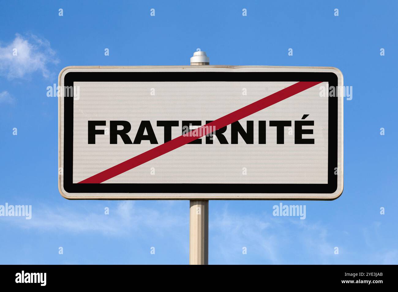 A French exit city sign against a blue sky with written in the middle ...