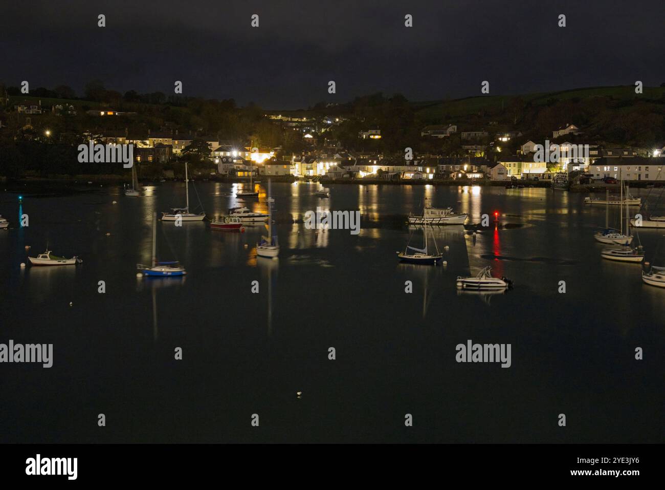 A nightscape across the Penryn River to Flushing, Falmouth, Cornwall ...