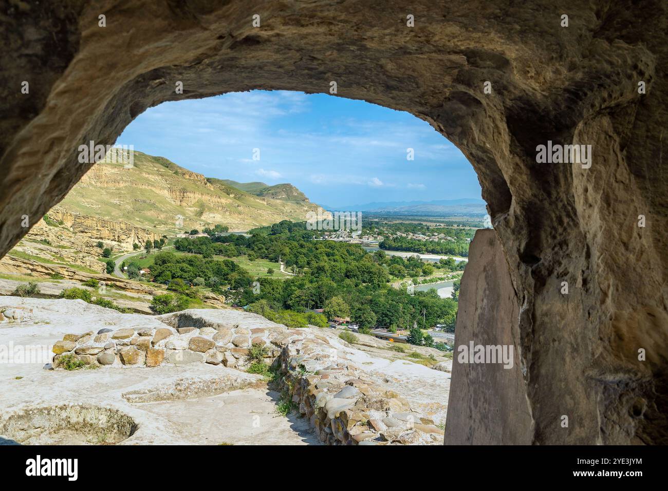 Framed view of valley from inside Uplistsikhe Cave Town. Ancient pre ...