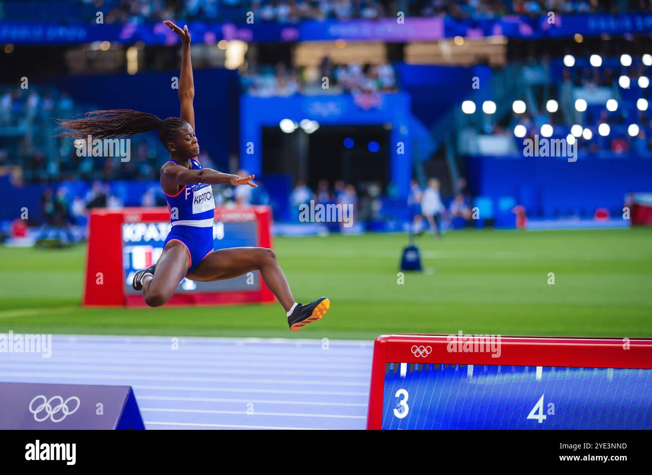 Hilary Kpatcha participating in the long jump at the Paris 2024 Olympic ...