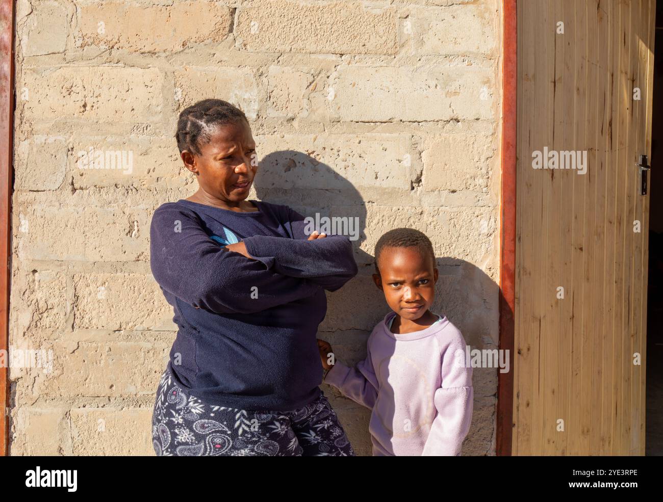 informal settlement, housing crisis, african mother and child in the ...