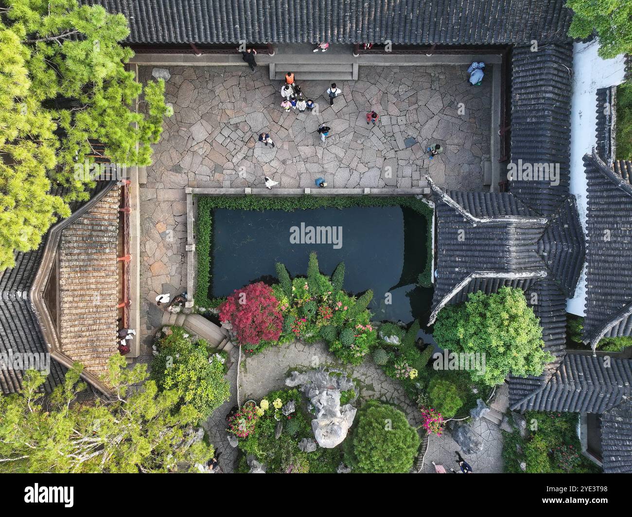 Suzhou. 23rd Oct, 2024. An aerial drone photo taken on Oct. 23, 2024 shows tourists visiting the ...