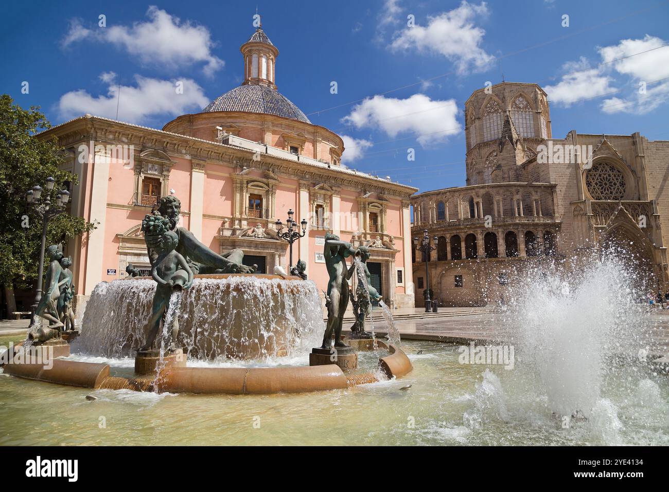 Fountain of the Turia with the Basilica of Our Lady of the Forsaken and ...