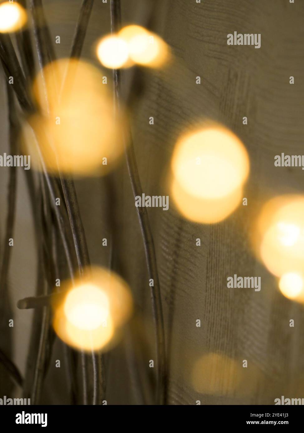Artistic picture of golden yellow light points blurred out of focus ...