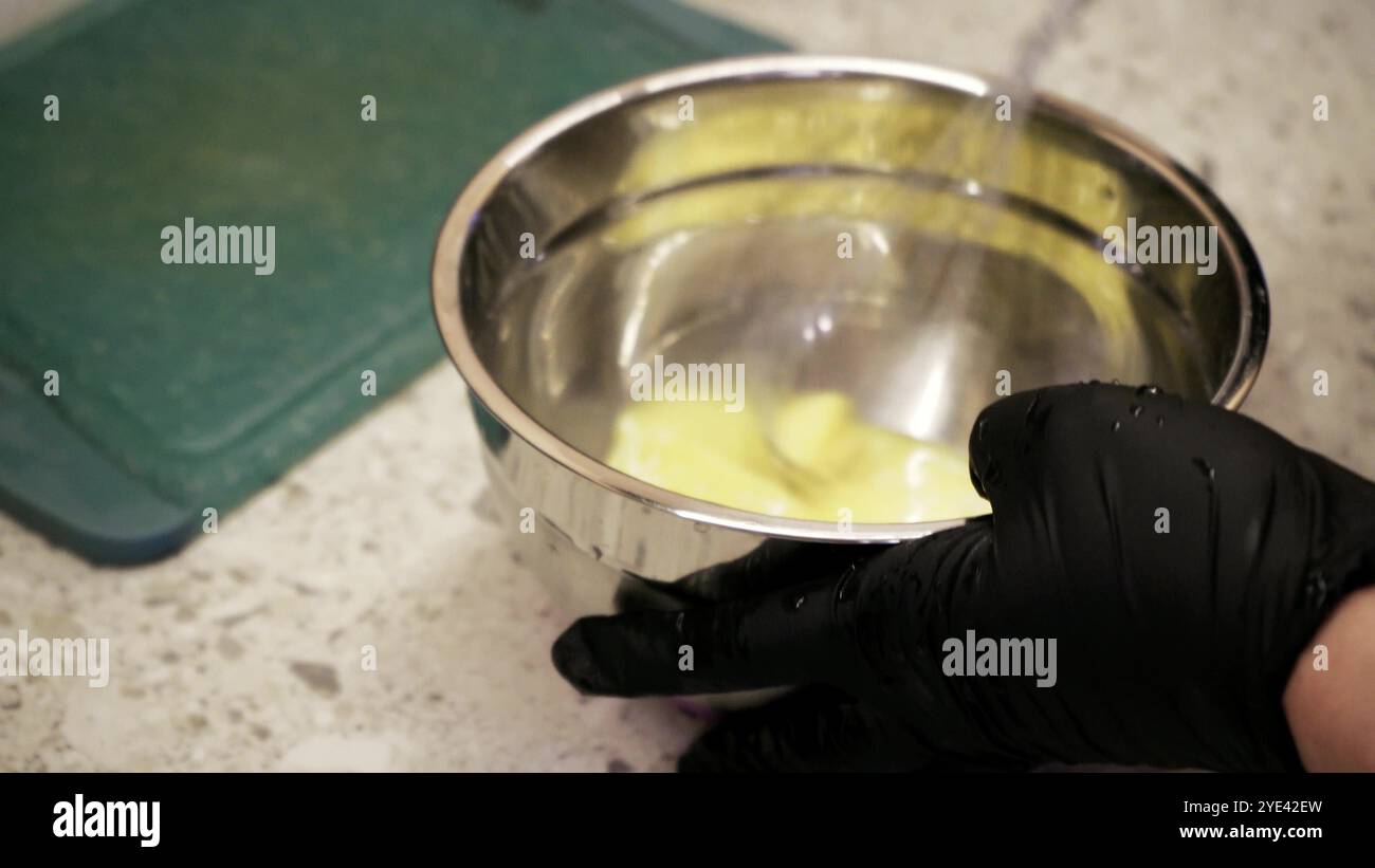The process of making savory waffles comes to life when a young woman ...