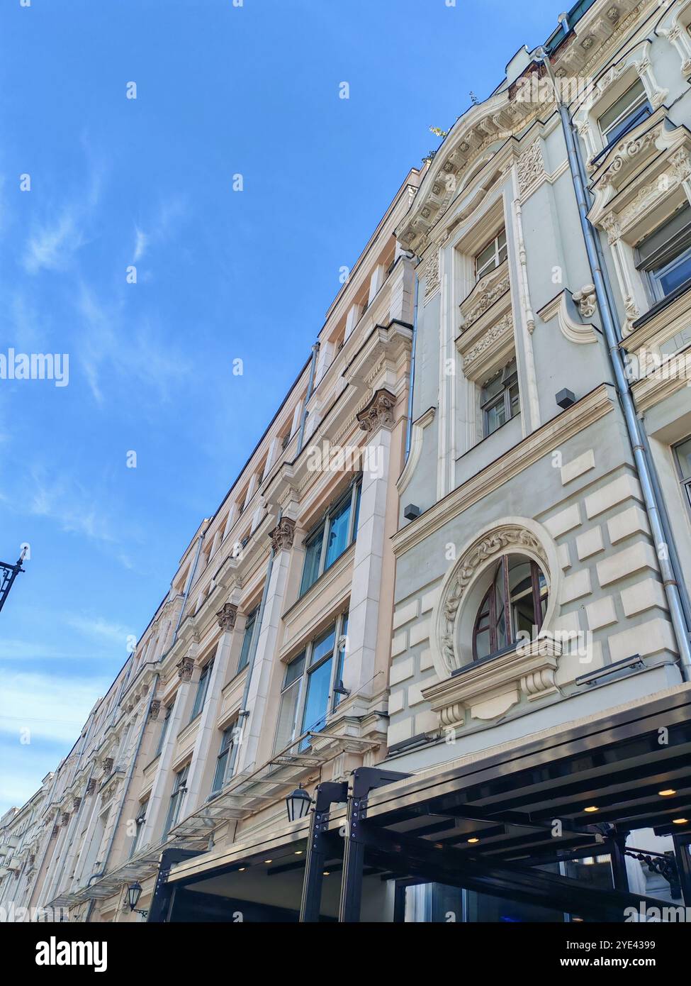 tall, elegant building with a combination of classical and modern ...