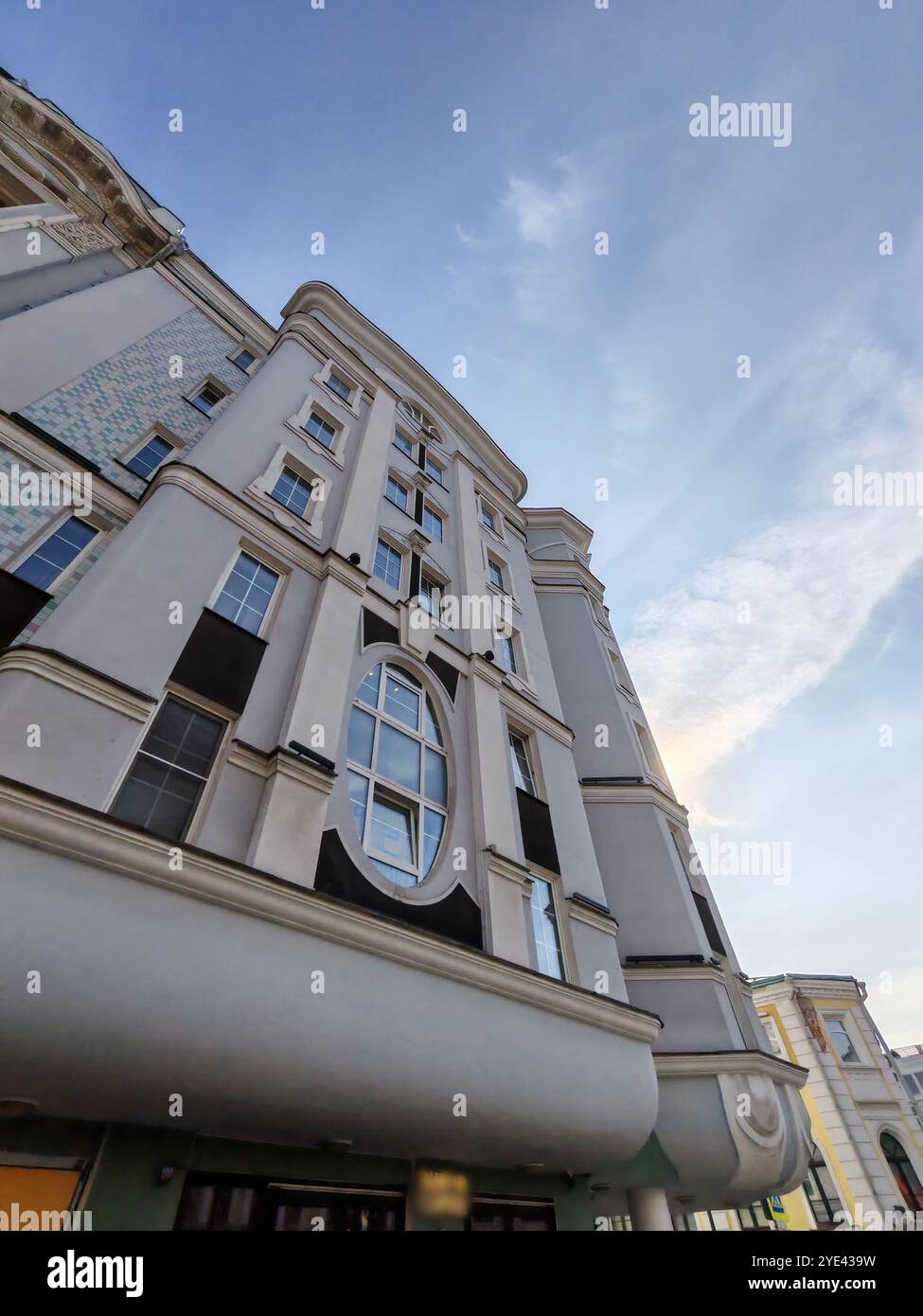 tall, elegant building with a combination of classical and modern ...