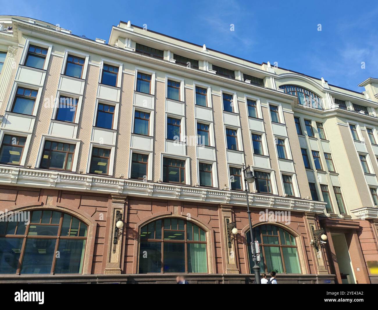 historical pink building with multiple floors, adorned with decorative ...