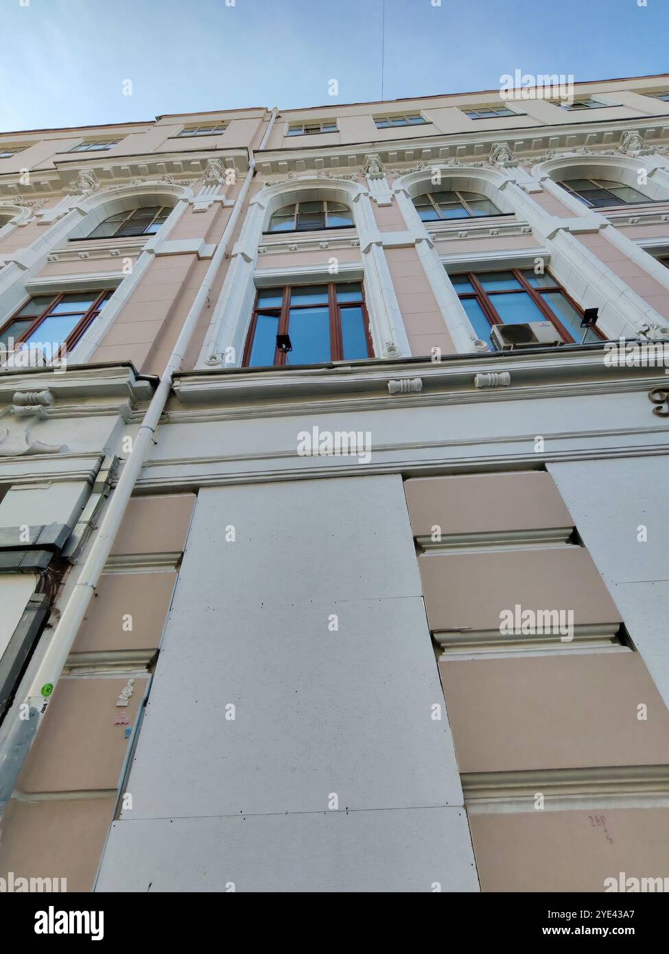 tall, elegant building with a combination of classical and modern ...