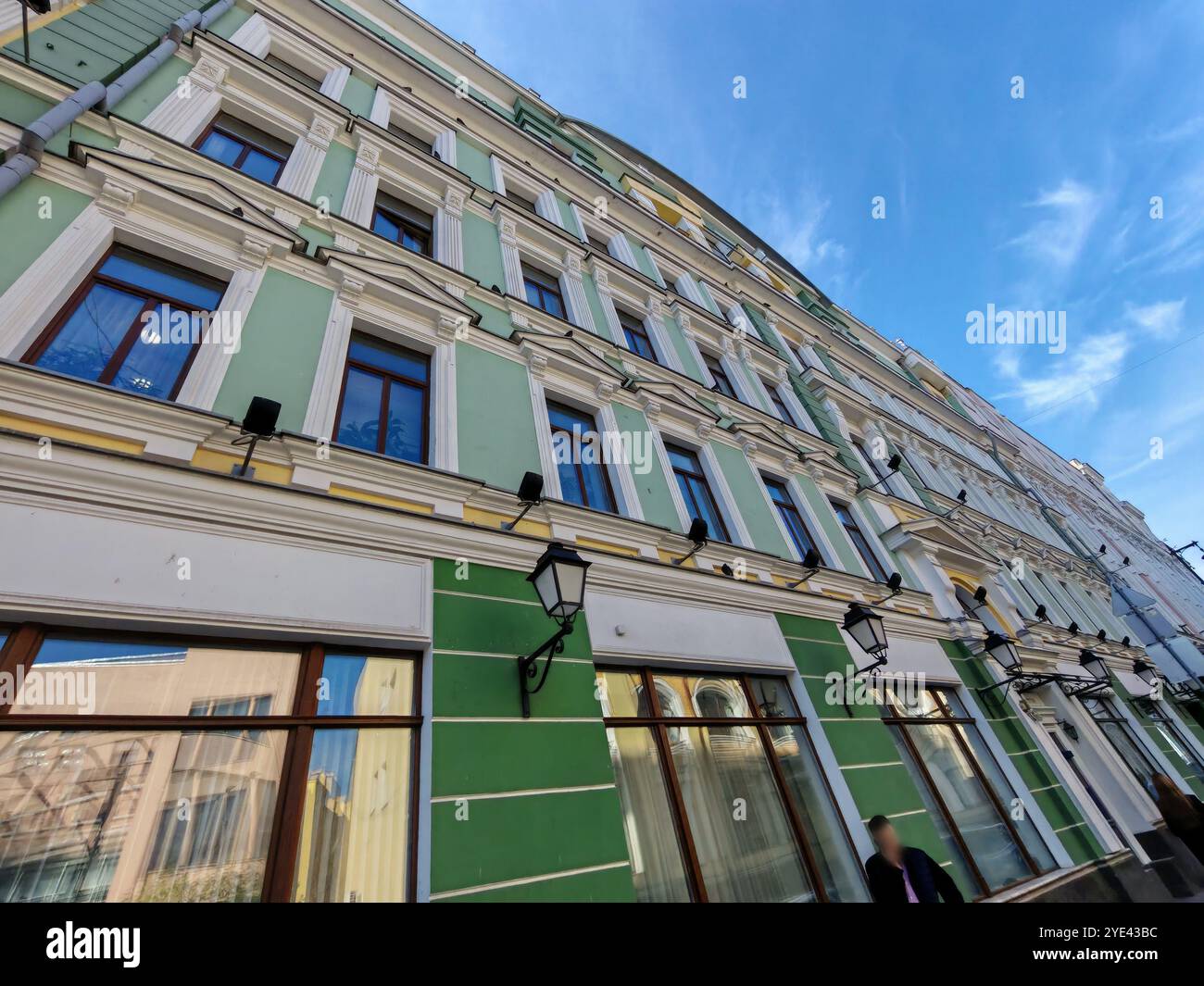 sophisticated building with arched upper windows, classical decorative ...