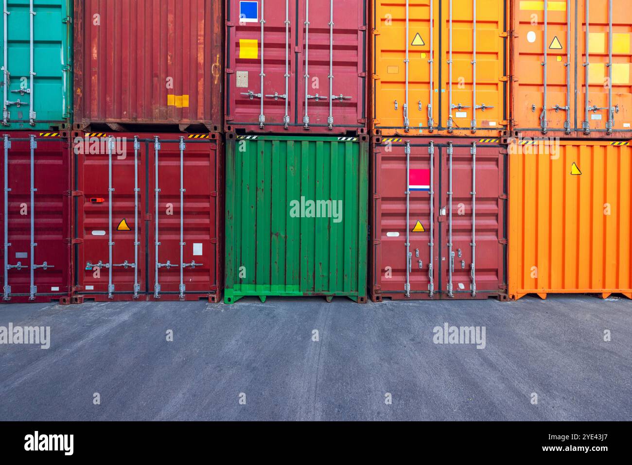 Colorful shipping containers stacked arrangement in a harbour storage ...