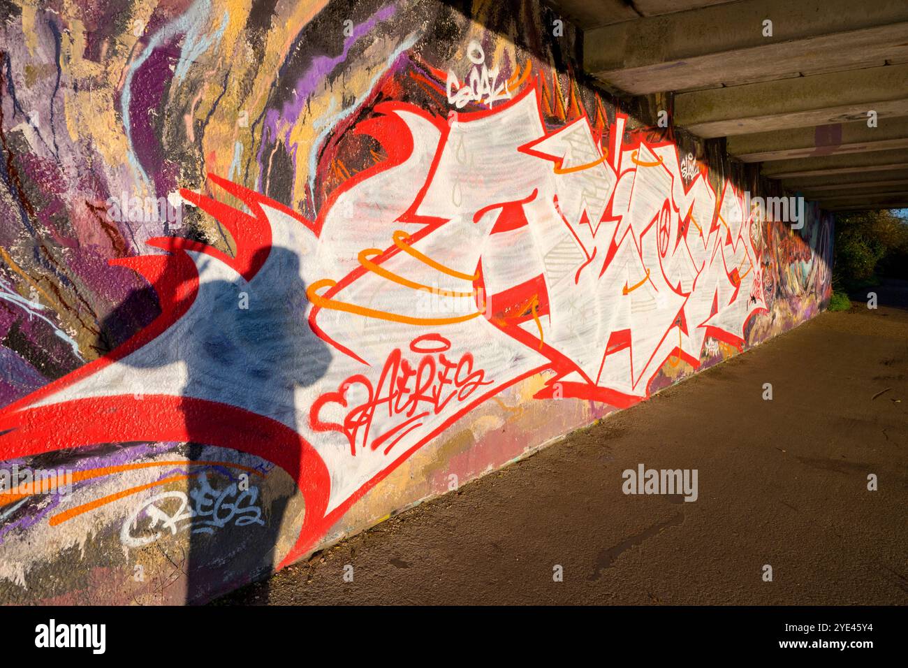 Graffiti and Shadows beneath Donnington bridge over the Thames. It's ...