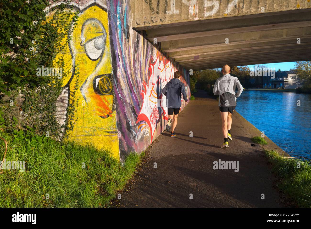 Graffiti and Shadows beneath Donnington bridge over the Thames. It's ...