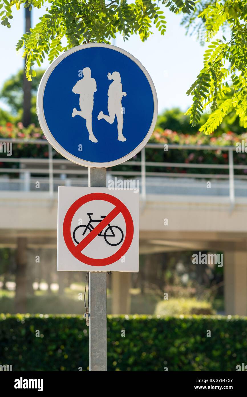 road signs treadmill in the park Stock Photo - Alamy