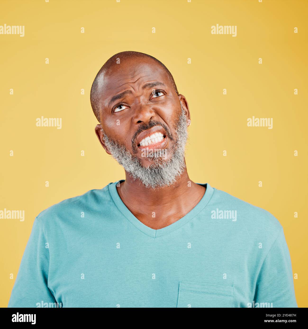 Thinking, frustrated and mature black man in studio with memory ...