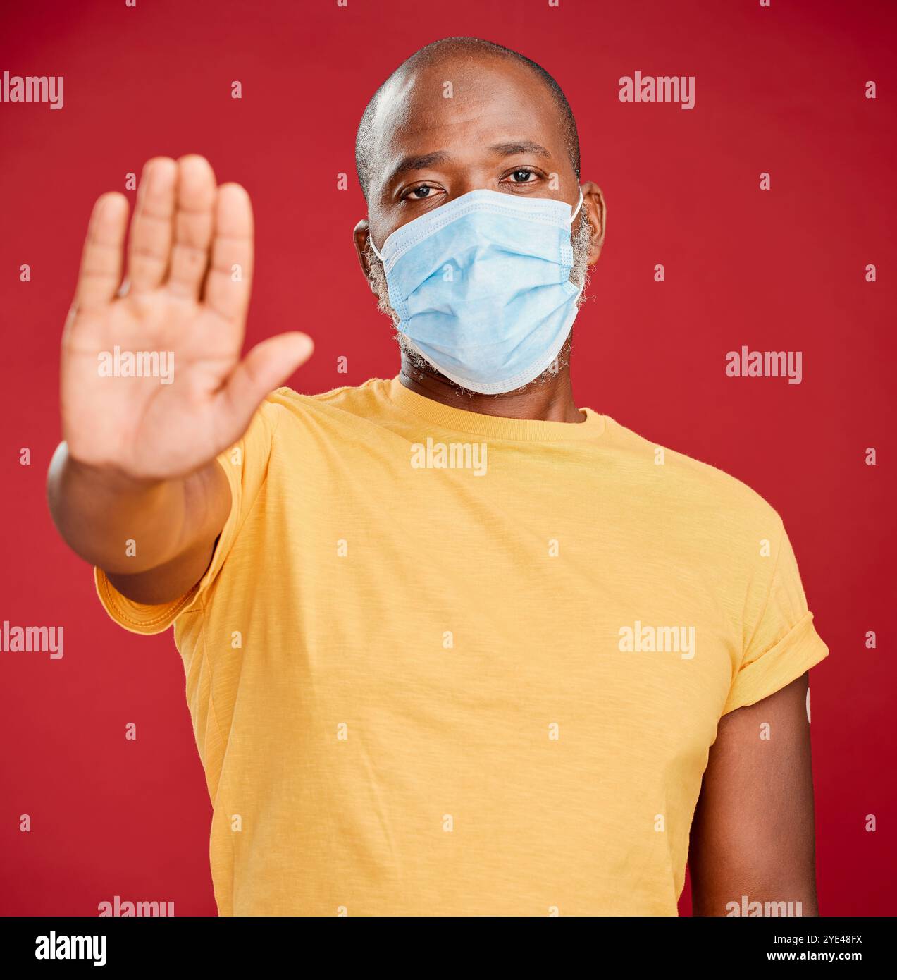 Black man, portrait and mask with hand for stop, halt or no entry on a ...