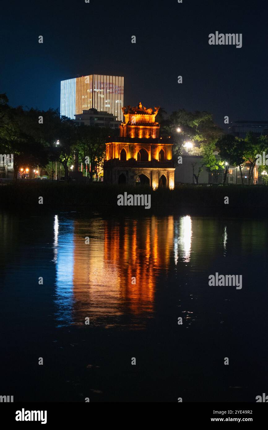 Hanoi, Vietnam: view of the night skyline with the Turtle Tower (Thap ...
