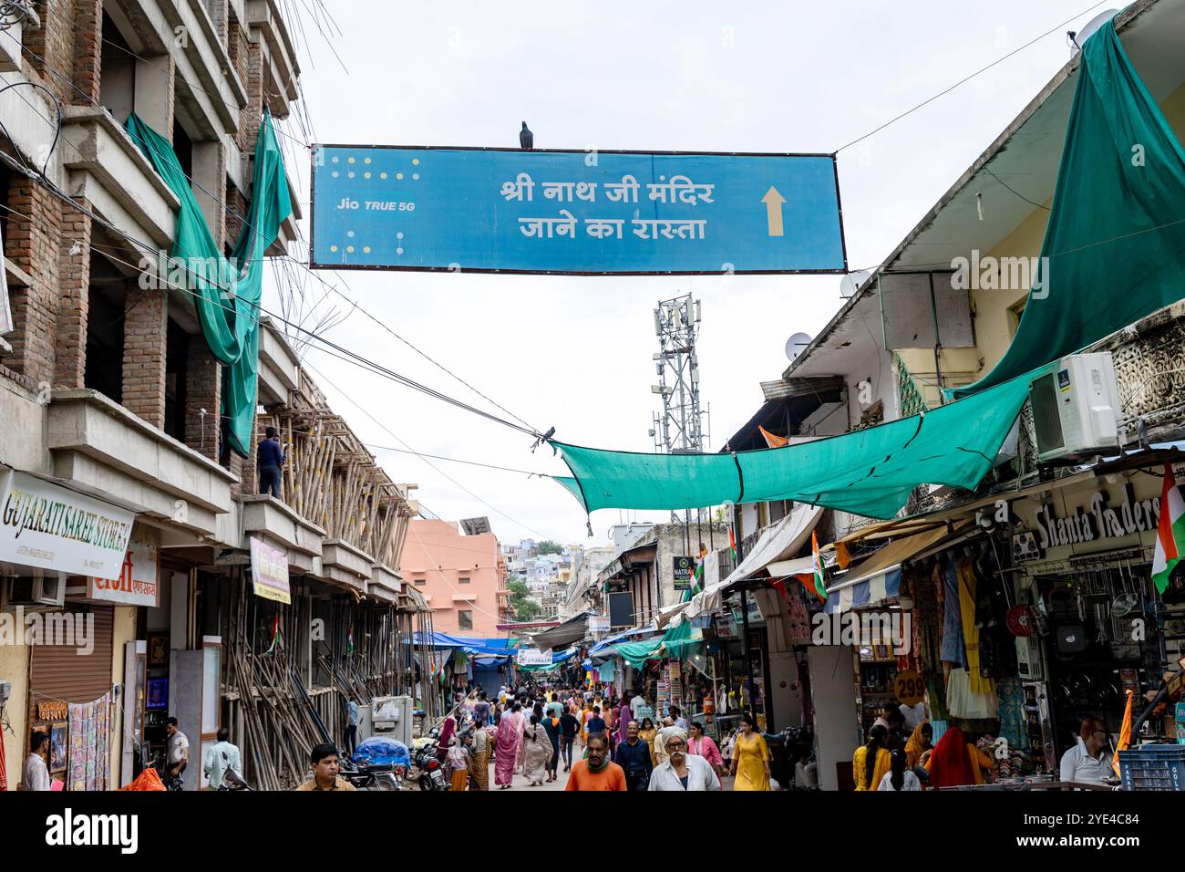 Devotees Walking on Hindu Temple Street at Daytime image is taken at ...