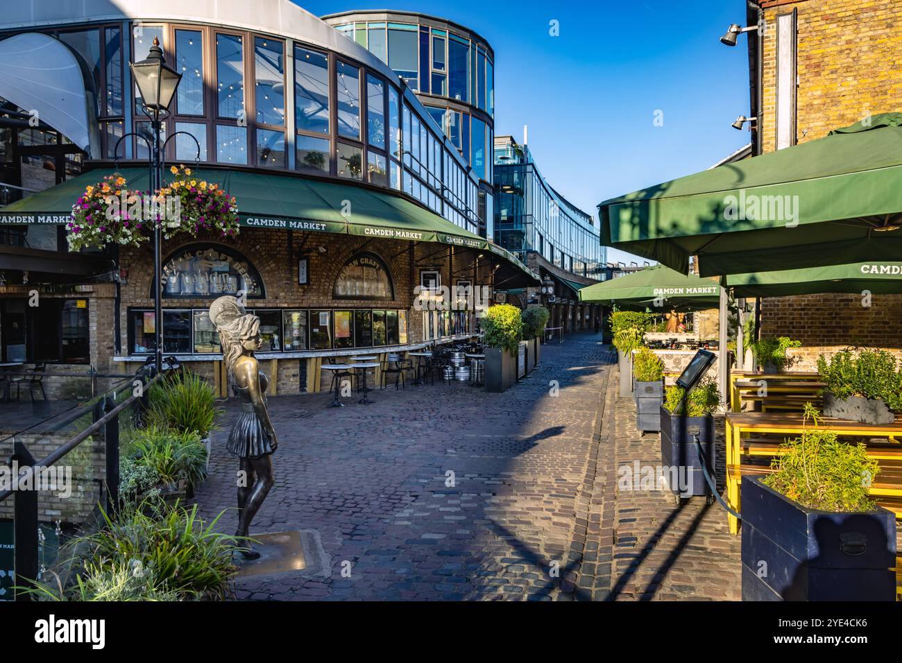 Camden Market in Camden Town, with a bronze statue of the Grammy award ...