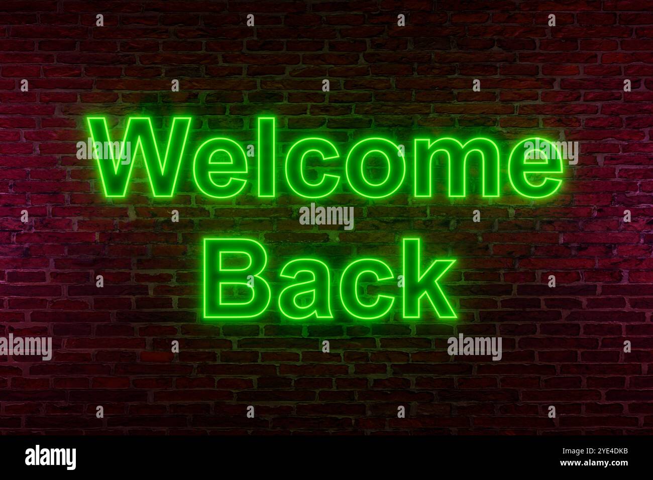 Welcome back. Welcome back. Brick wall at night with the text welcome ...