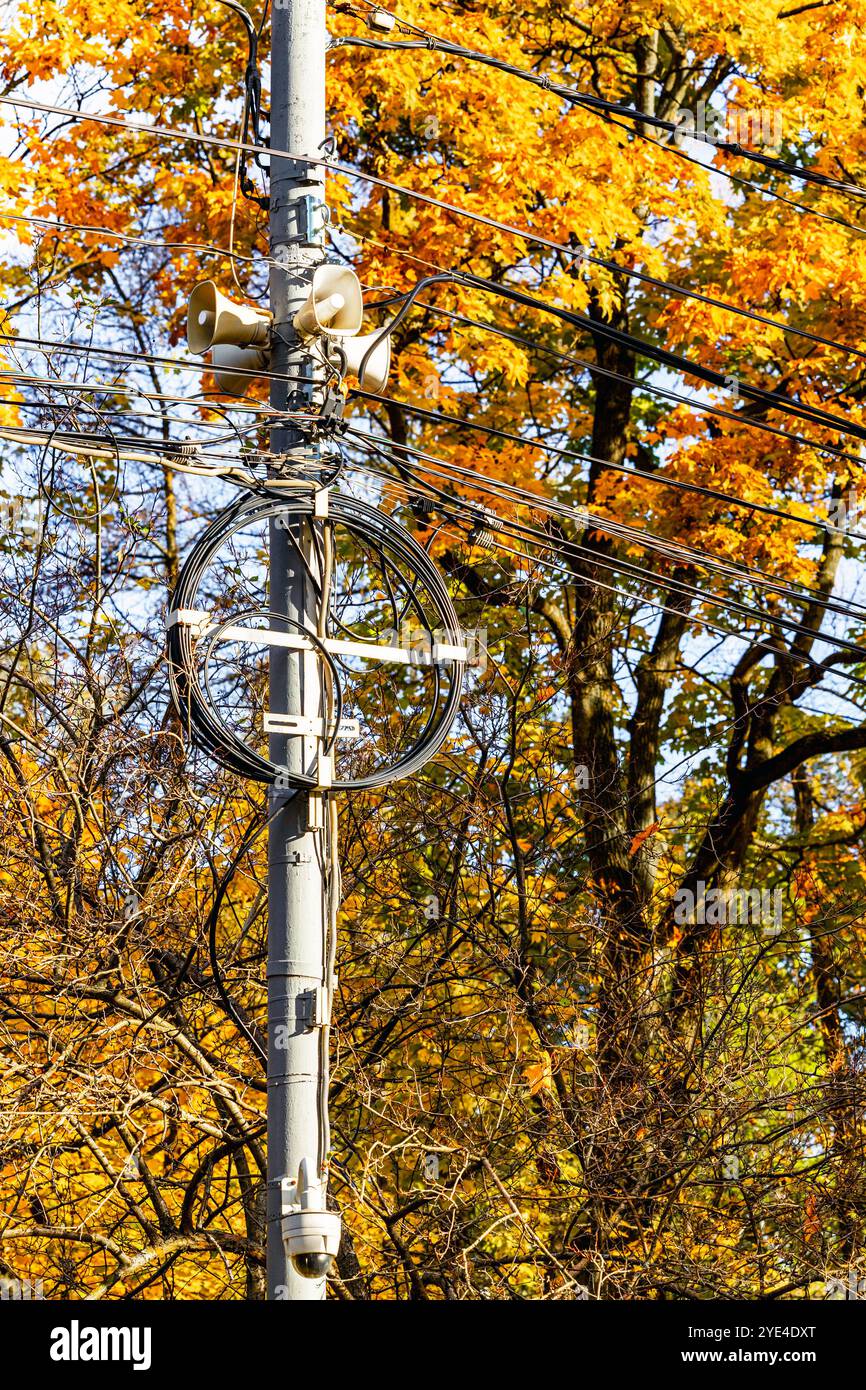 loudspeaker on street pole with wires, vertical photo. loudspeaker ...
