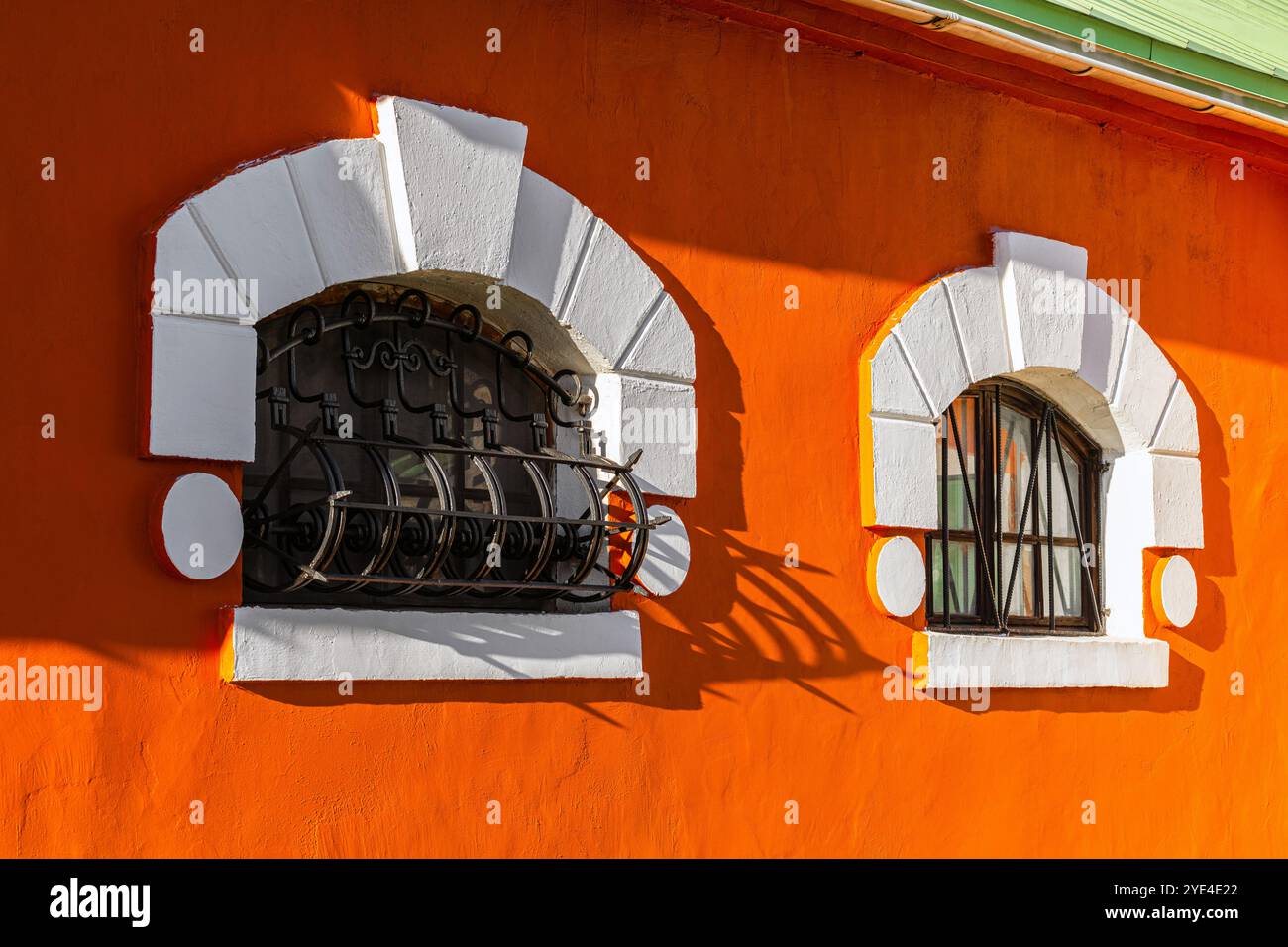 window opening covered with metal bars, close-up. windows covered with ...