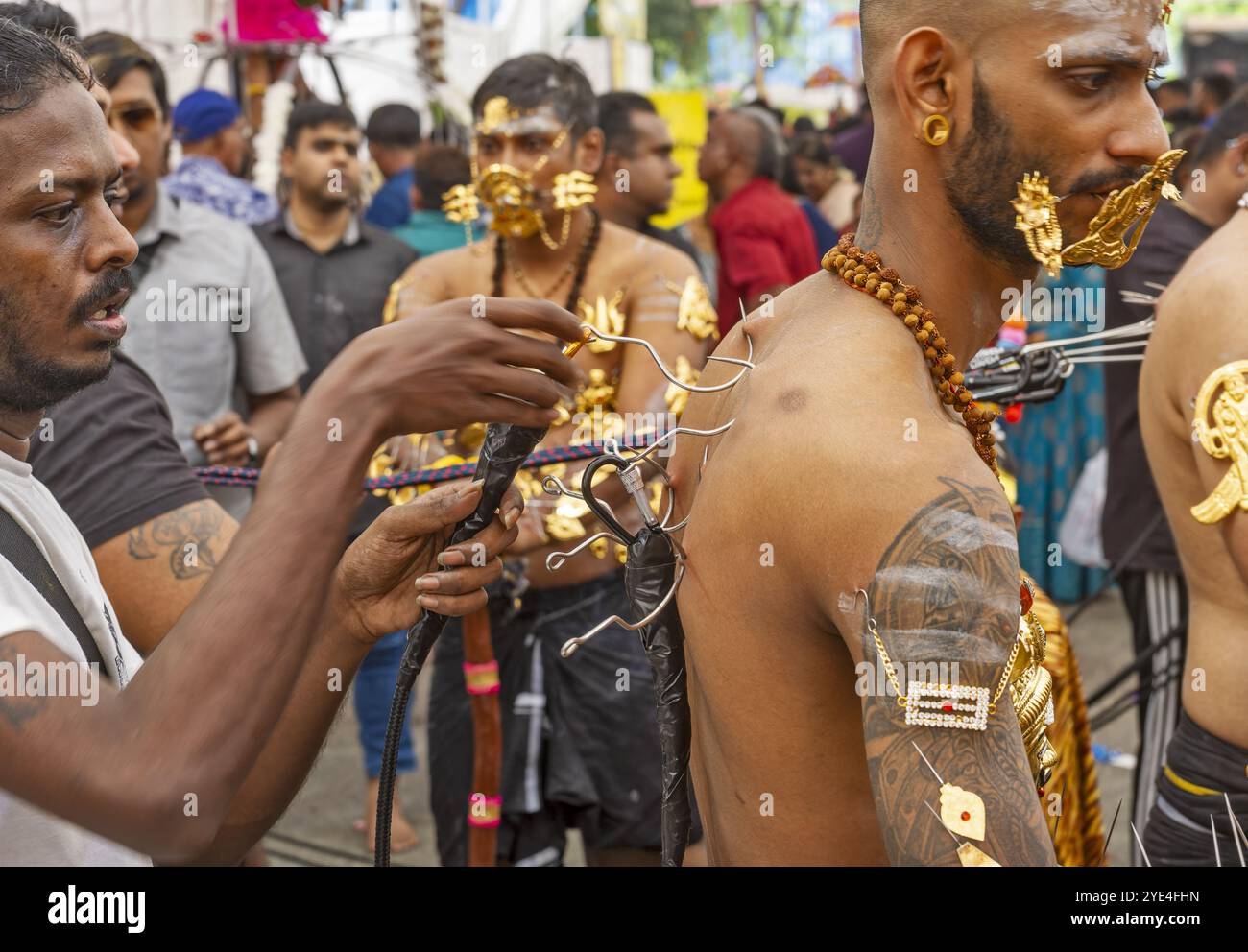 Thaipusam festival in Singapore devotees practice a mortification of ...