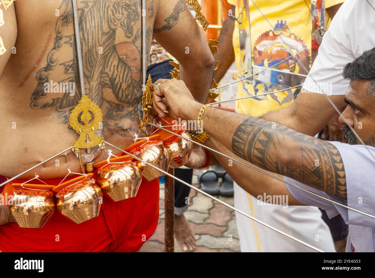 Thaipusam festival in Singapore devotees practice a mortification of ...