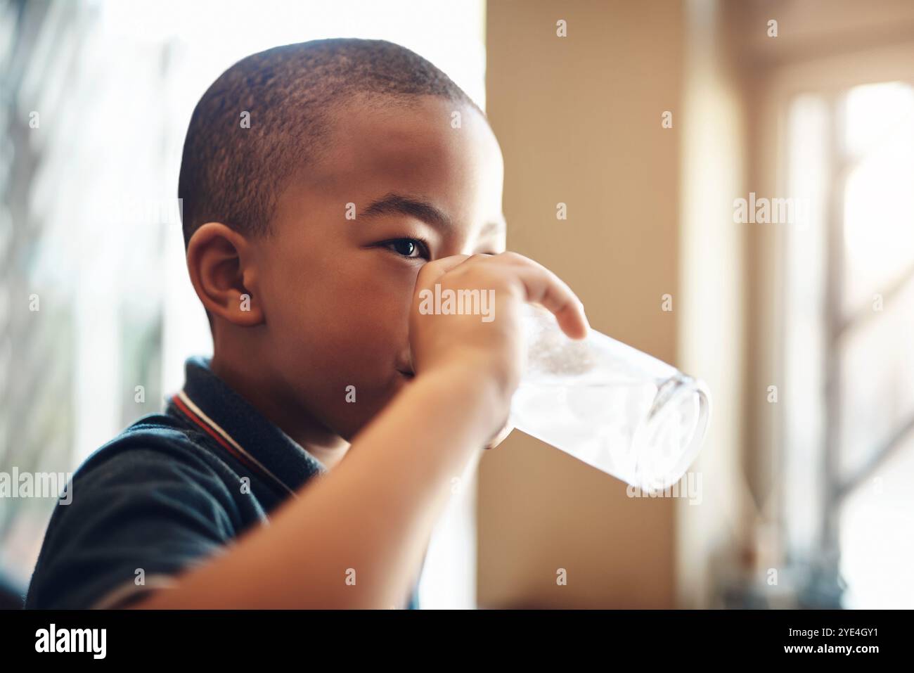 Drinking, water and African boy child in home with fresh hydration ...