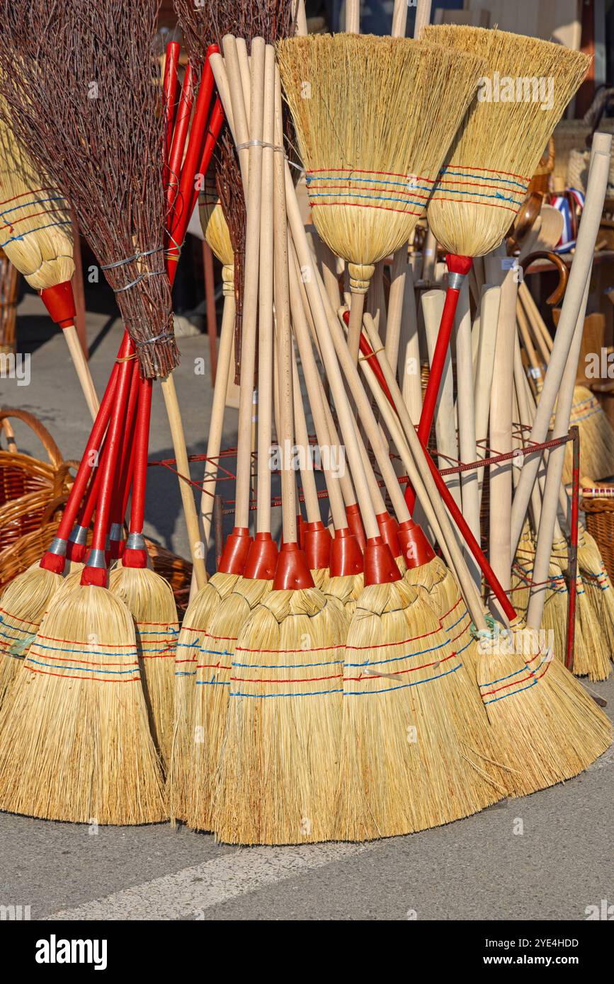 Bunch of Sorghum Made Brooms With Long Handles Stock Photo - Alamy