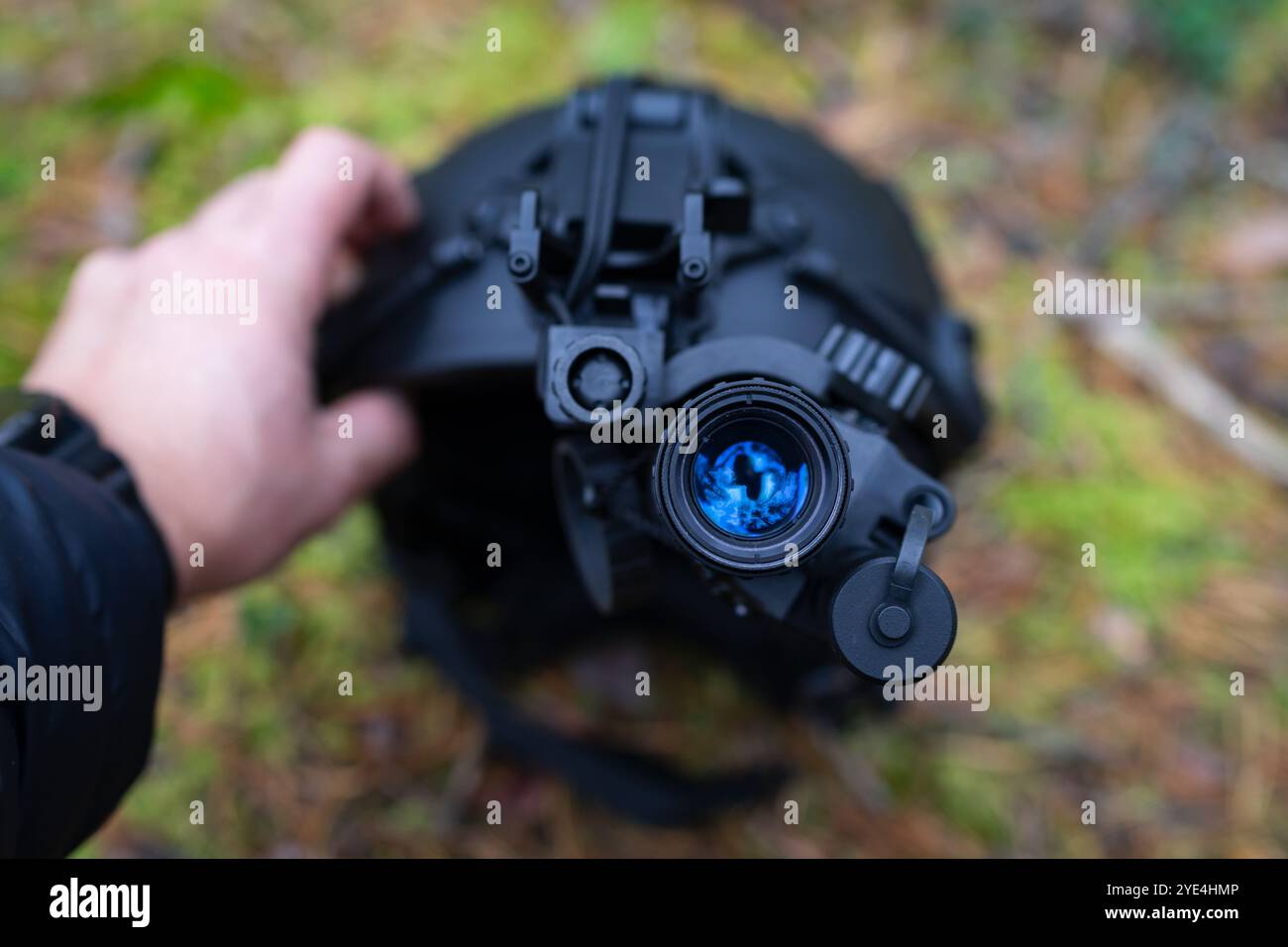 Tactical helmet with night vision device in a man's hand Stock Photo ...