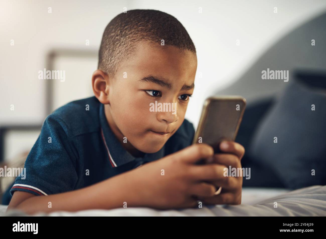 African child, smartphone and search in bedroom for education, app or streaming subscription ...