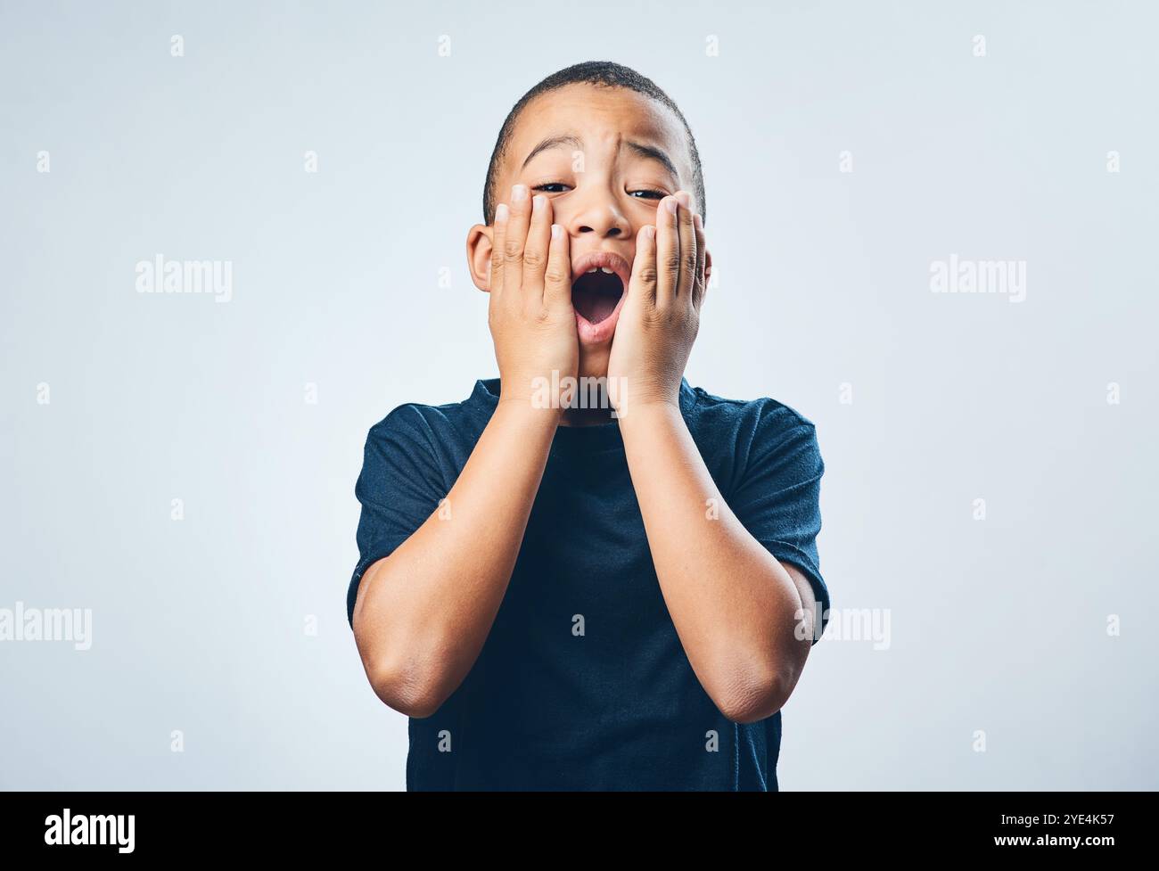Wow, shocked and boy in studio, child and scream for secret ...