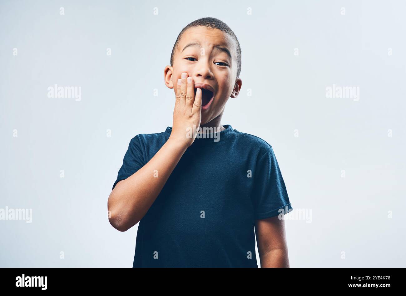 Wow, scream and boy in studio, child and shocked by secret ...